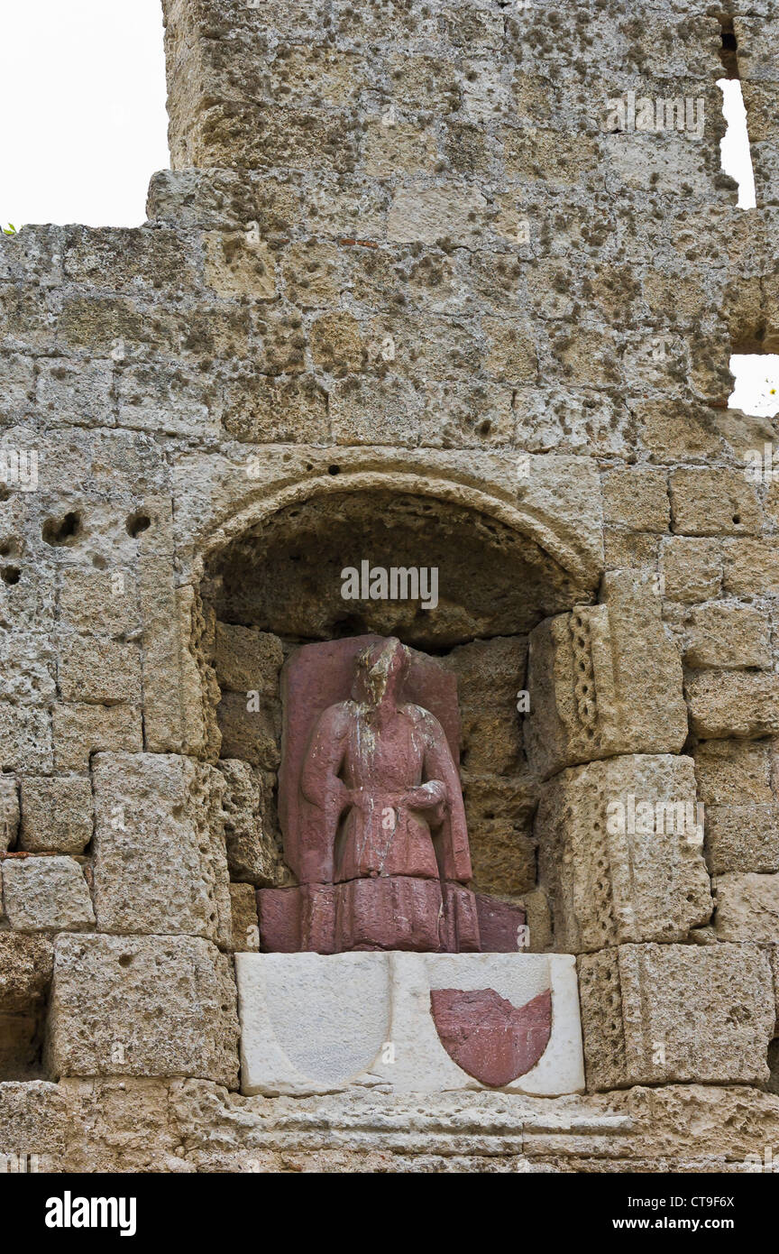 Crypt and statue in old building of Rhodes Citadel, Crete Island ...
