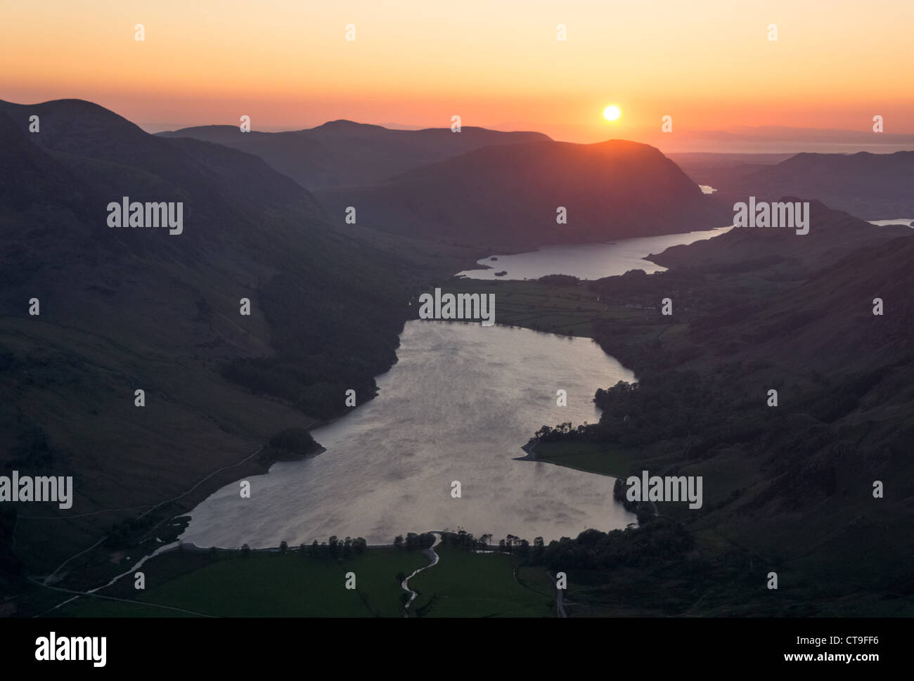 Lake Buttermere at Sunset from the summit of Fleetwith Pike in the Lake ...