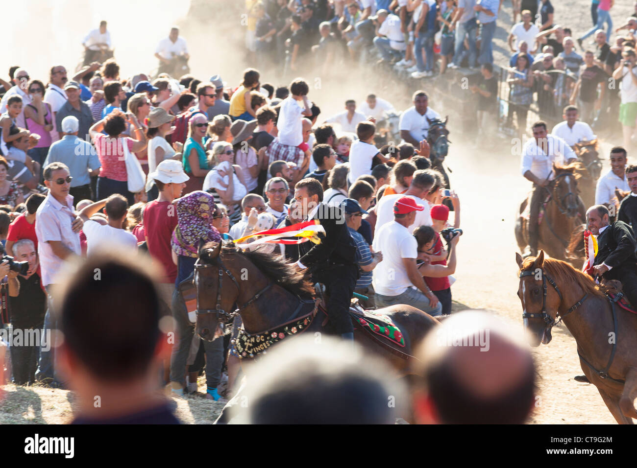 Traditional annual horse race in Sedilo, Sardinia, with a religious ...