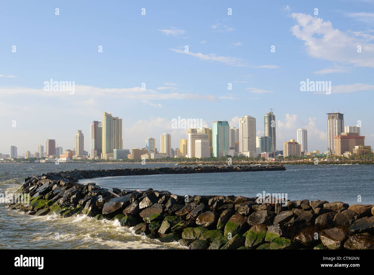 image of manila bay skyline with breakwater in the foreground during ...