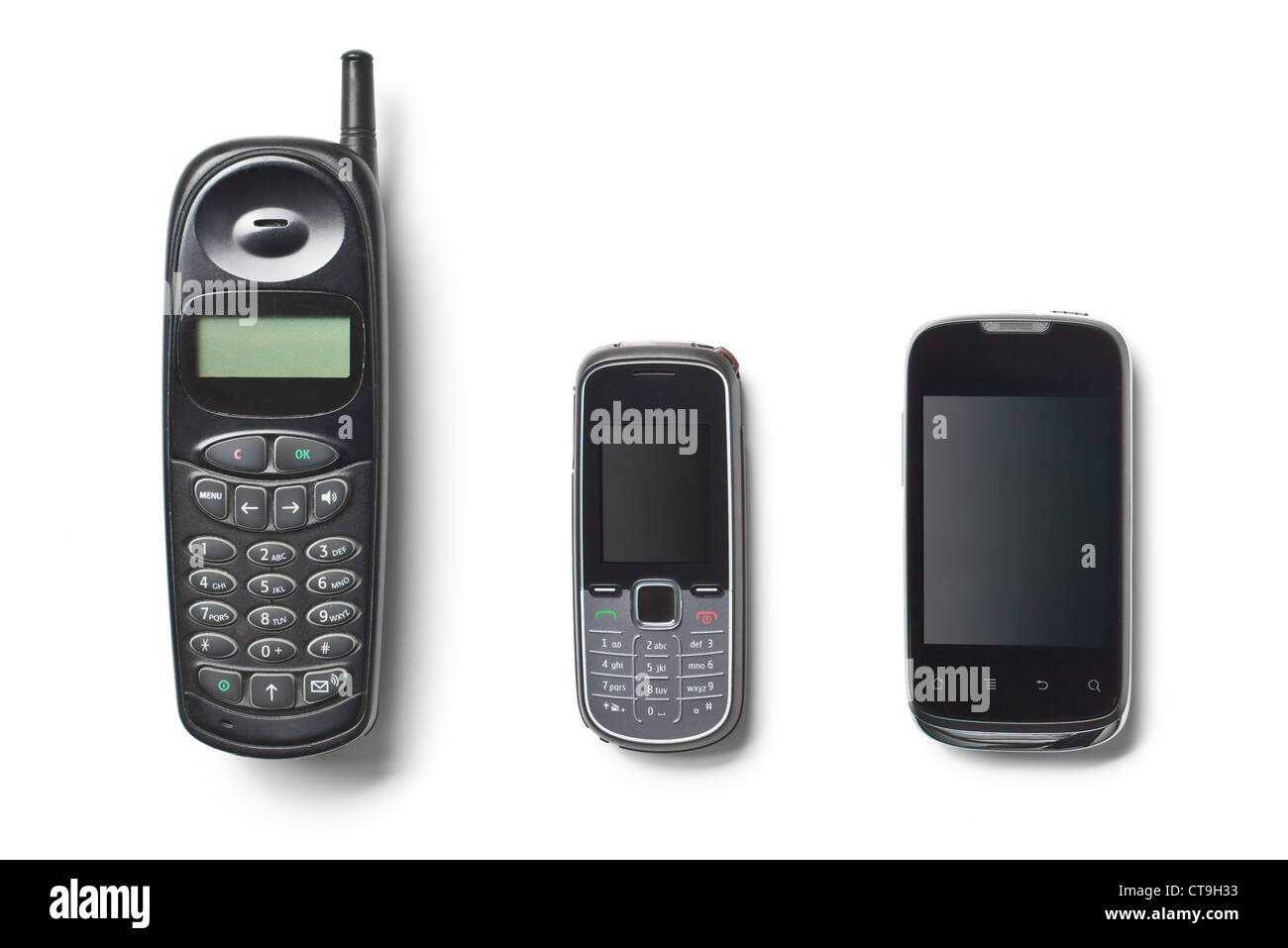 set of three generation cellphones on white background Stock Photo - Alamy