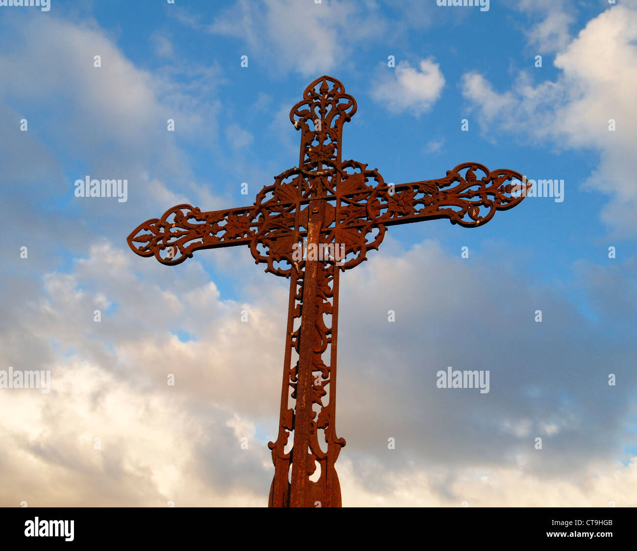 Decorative iron roadside cross - France Stock Photo - Alamy