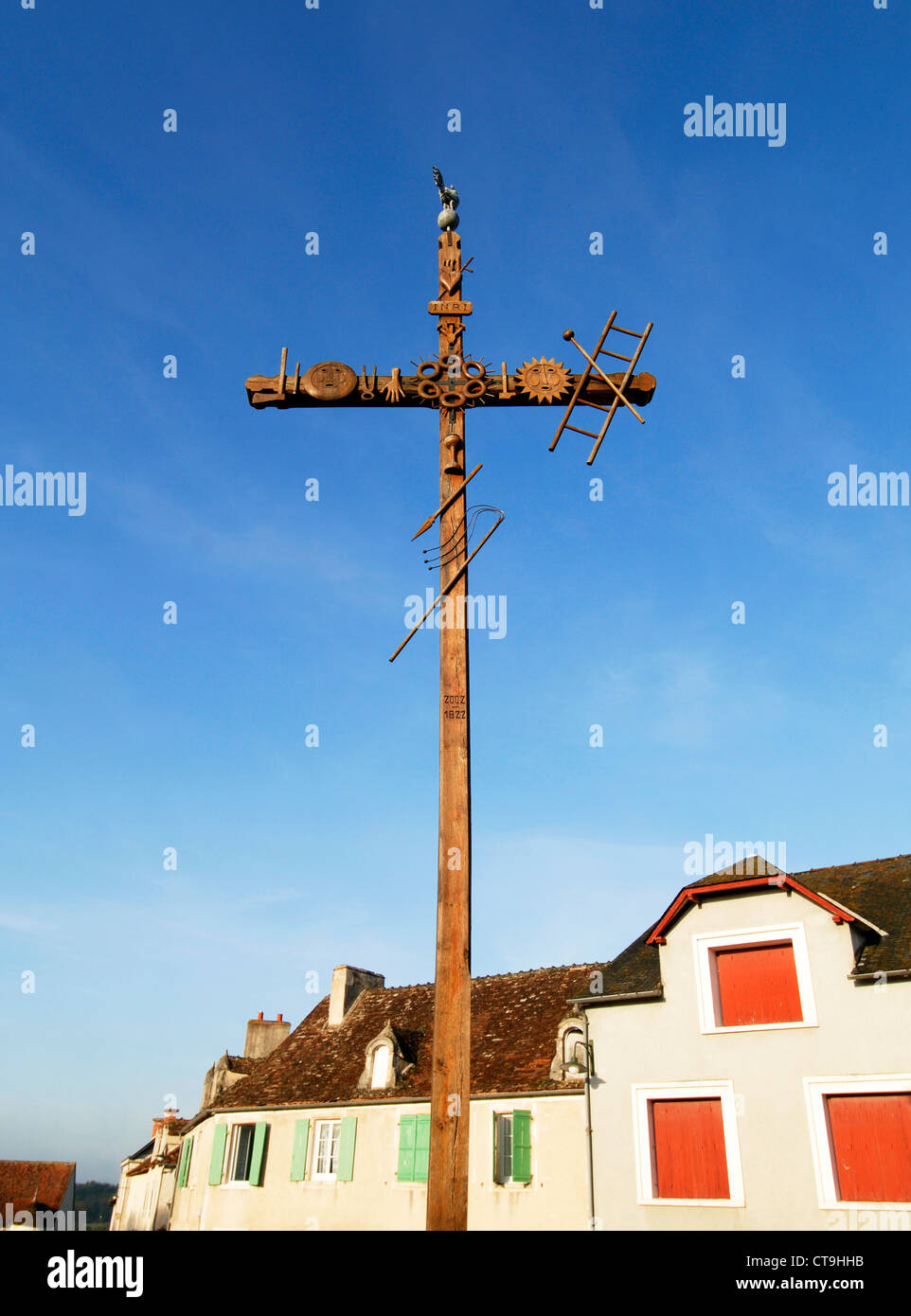 Decorated wooden cross, Béthines, Vienne - France Stock Photo - Alamy