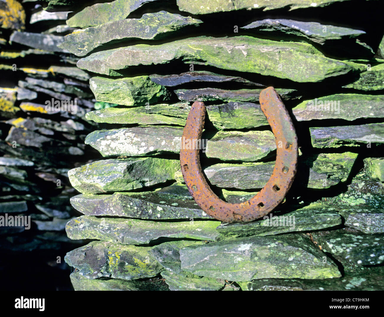 Random slate wall and horseshoe, Wales, UK Stock Photo - Alamy