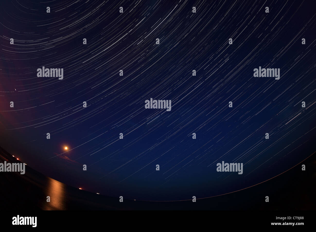 Night landscape, night sky with moving stars over the sea. Moon Stock ...