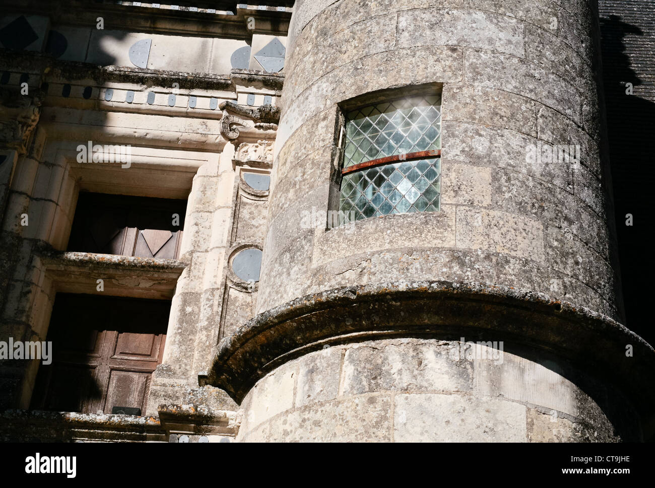 old glass window in medieval tower of Chateau de Chambord, France Stock ...