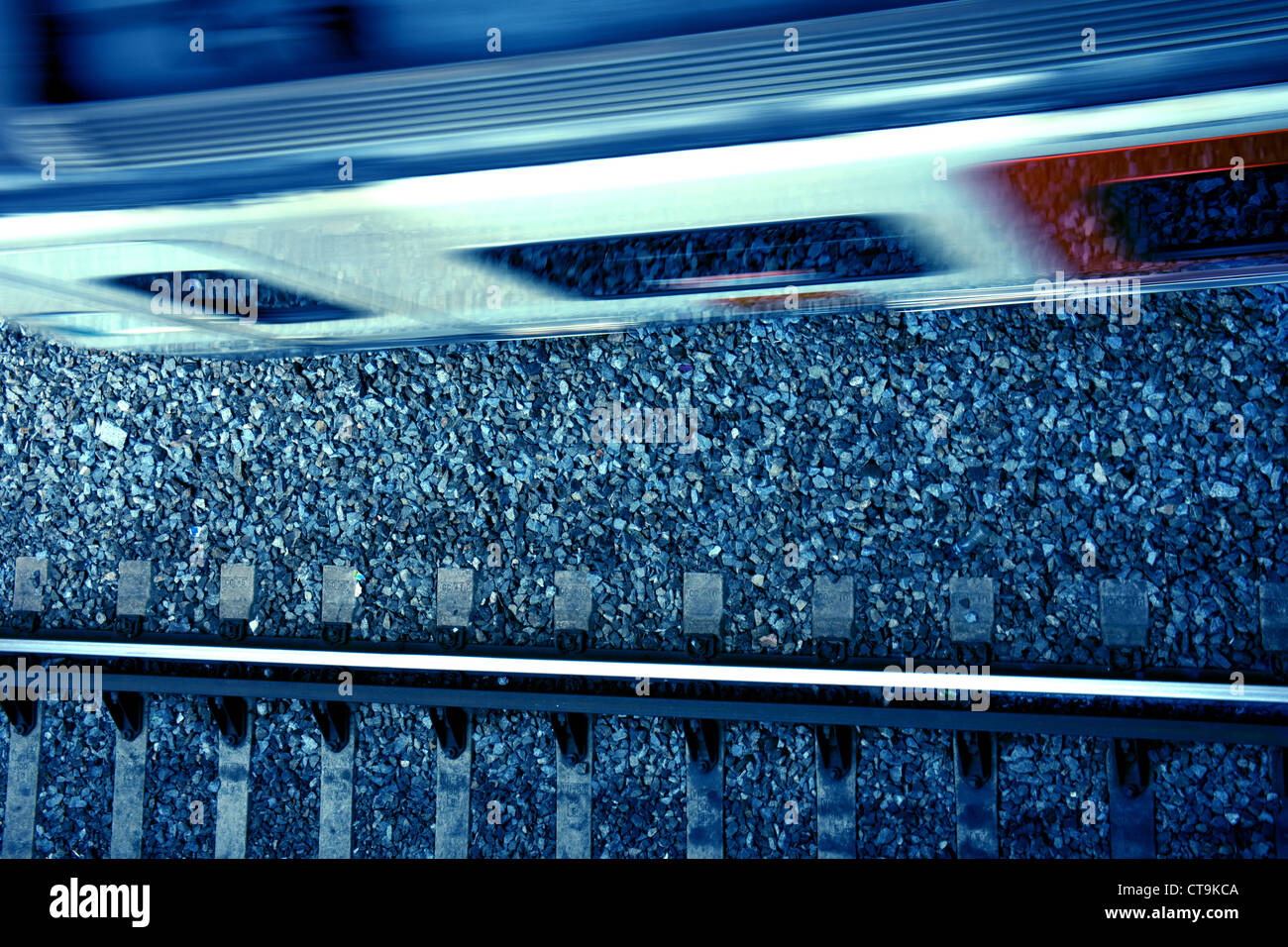 Train passing by with motion blur background Stock Photo - Alamy