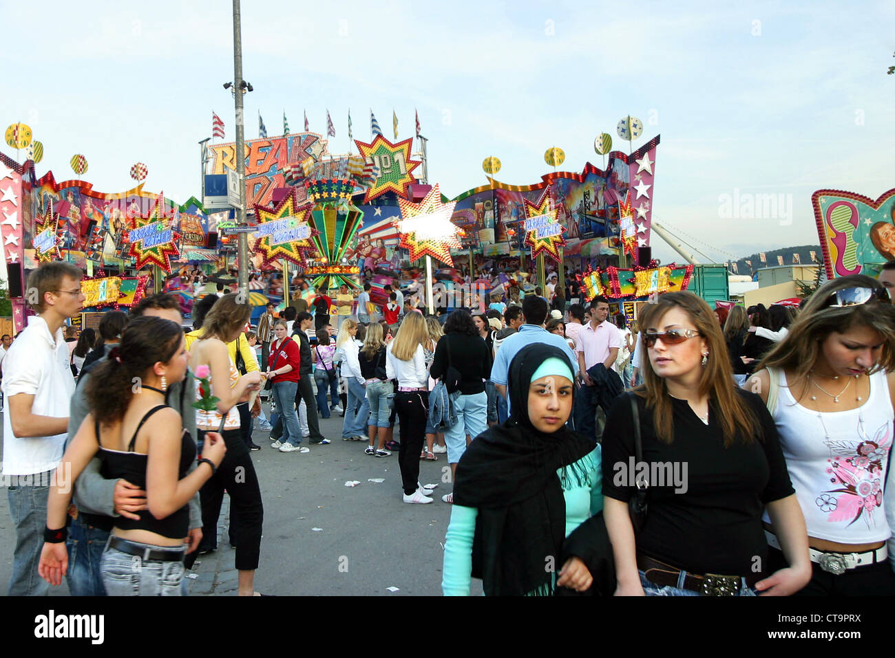 Young people at the Fair Stock Photo - Alamy