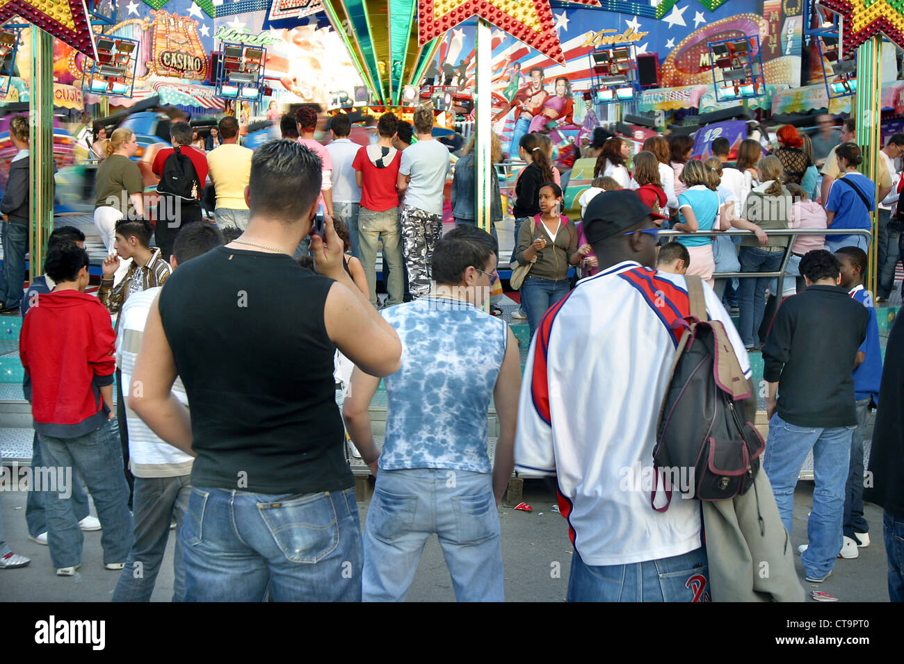 Young people at the Fair Stock Photo - Alamy