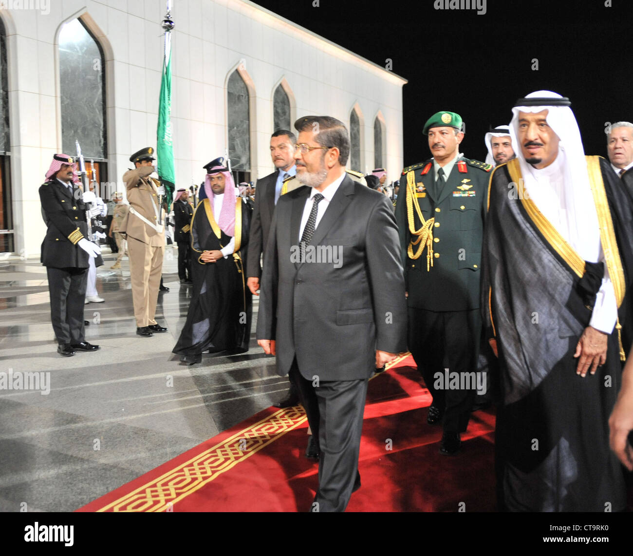 Newly-elected Egyptian President Mohamed Morsi makes his first foreign ...