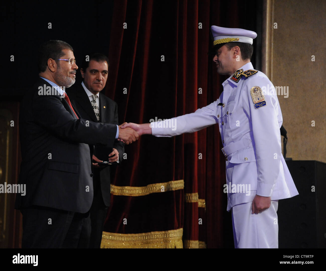 Egypt's newly elected president Mohamed Morsi attends a graduation ...