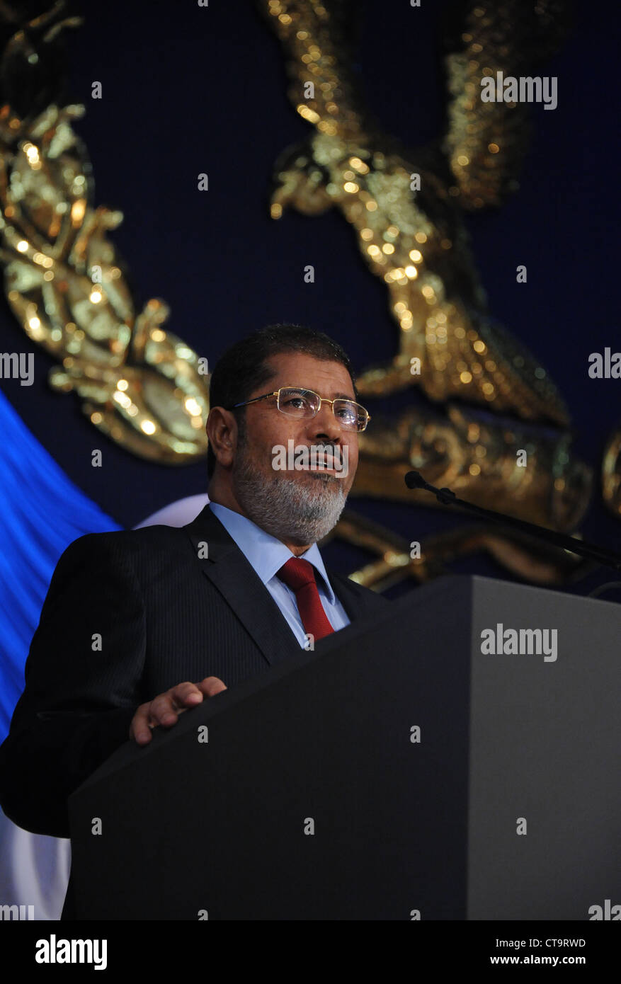 Egypt's newly elected president Mohamed Morsi attends a graduation ...