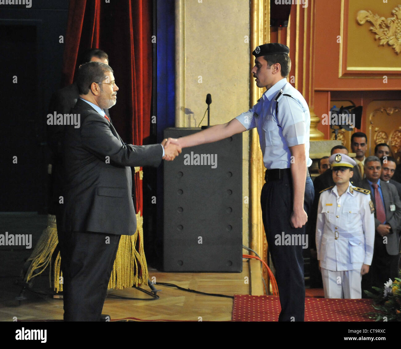 Egypt's newly elected president Mohamed Morsi attends a graduation ...