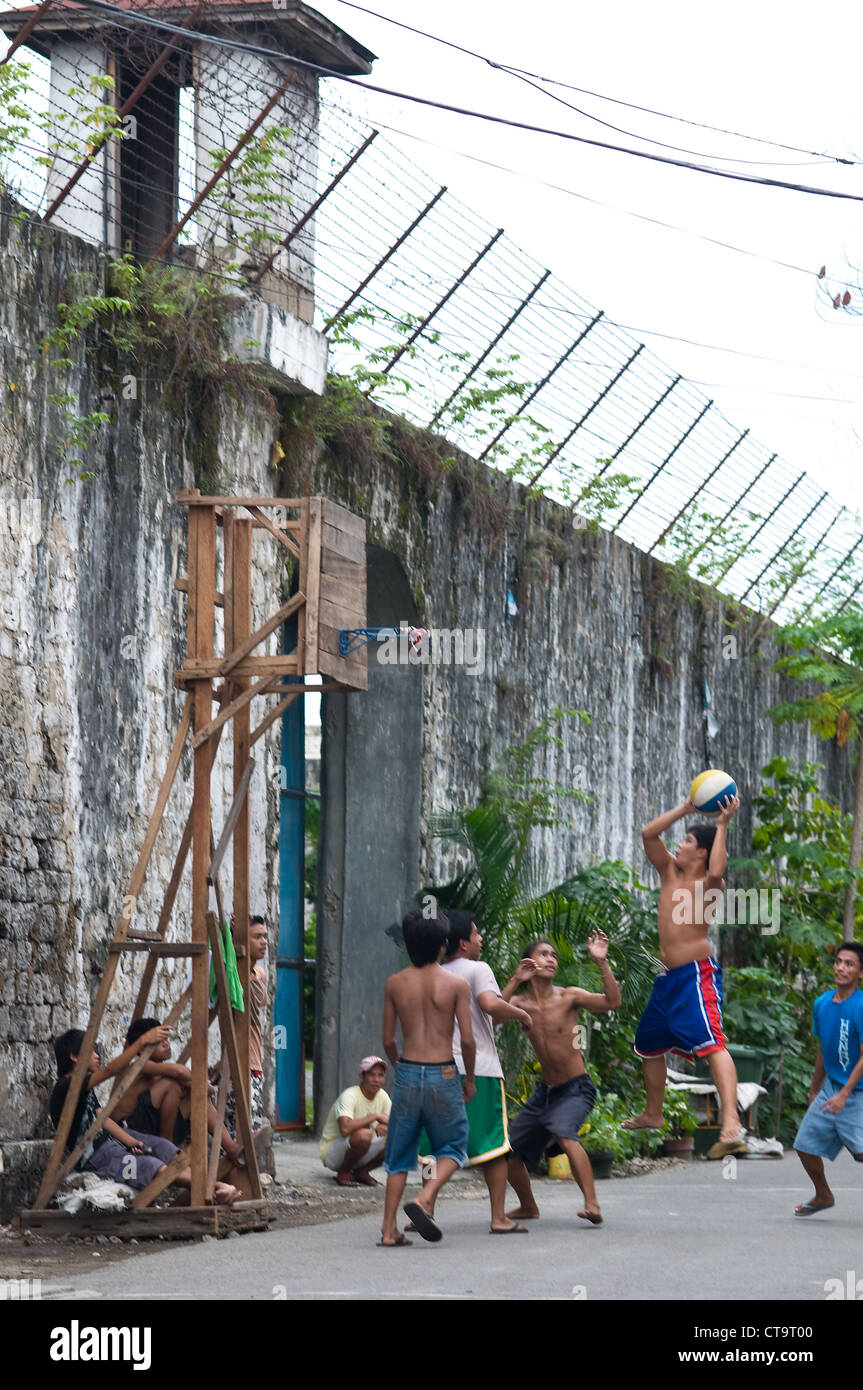 Boys playing basketball outside old Cebu Provincial Jail, Cebu City ...