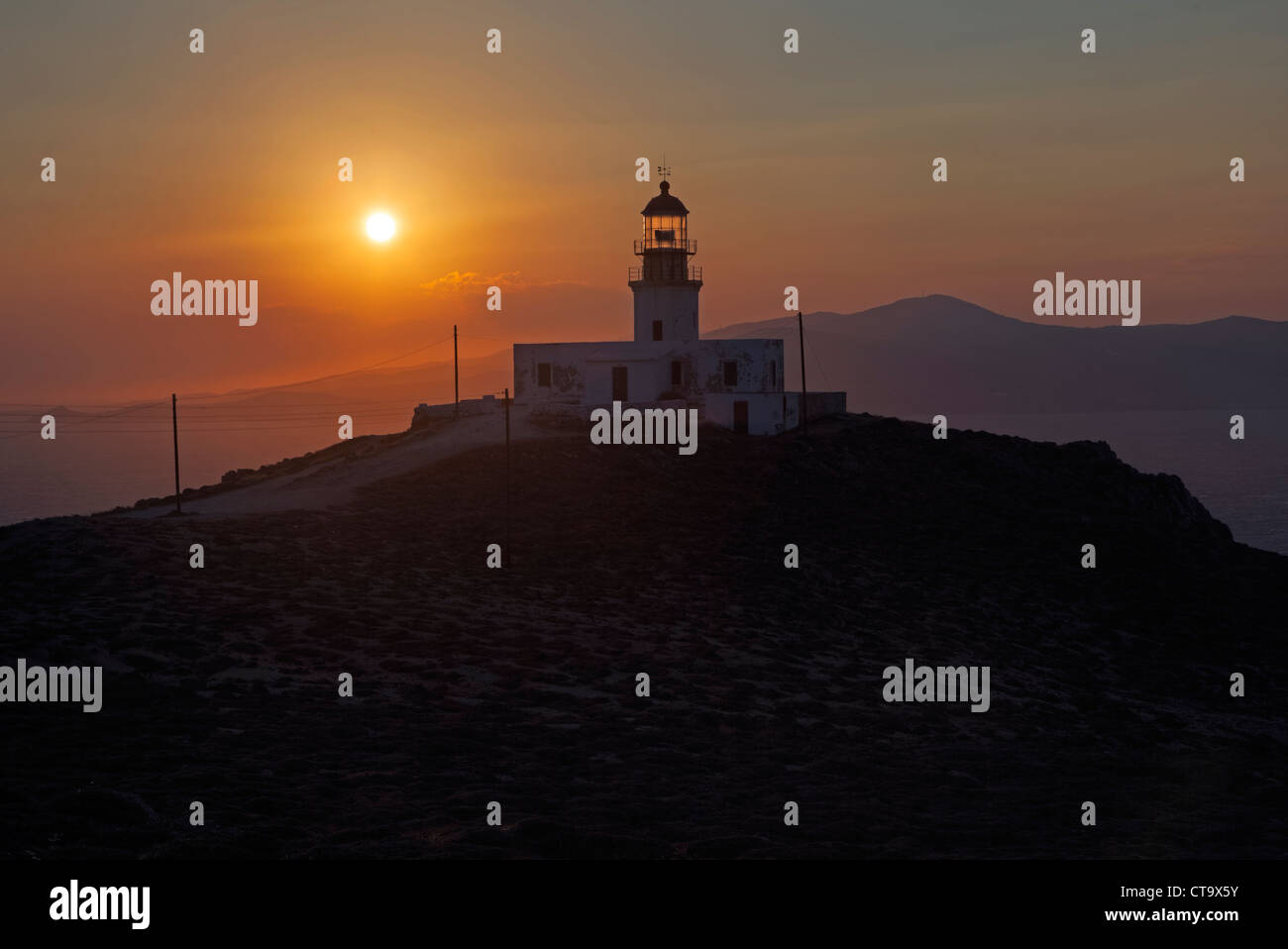 Lighthouse of Mykonos, Cape Armenistis, Greece at dusk Stock Photo - Alamy