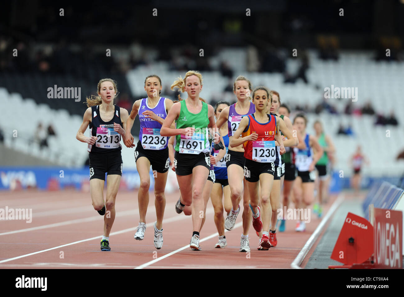 Athletes competing on a running track Stock Photo - Alamy