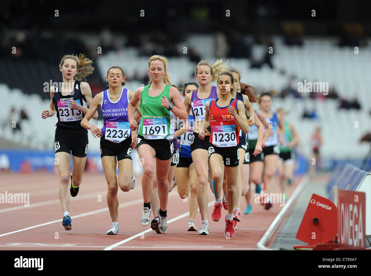 Athletes competing on a running track Stock Photo - Alamy