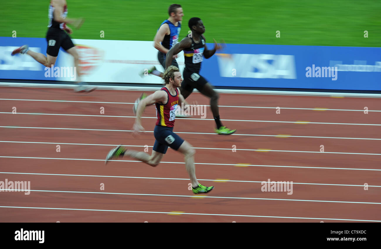 Sprinters competing on a running track Stock Photo - Alamy