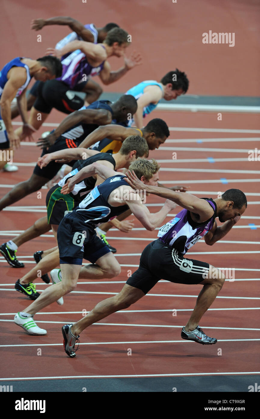 Athletes competing on a running track Stock Photo - Alamy