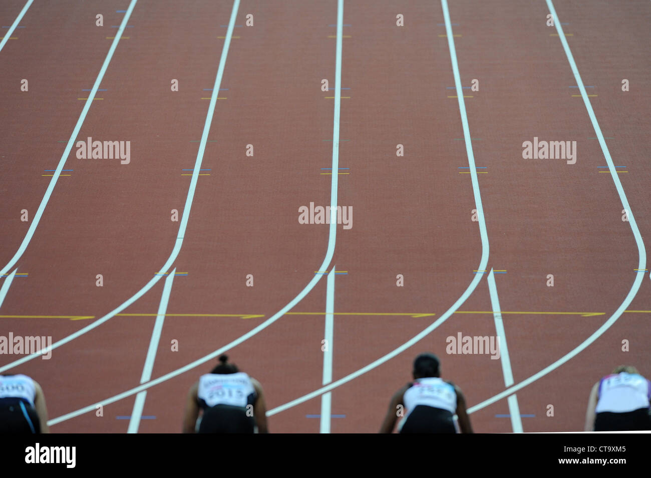 Athletes competing on a running track Stock Photo - Alamy