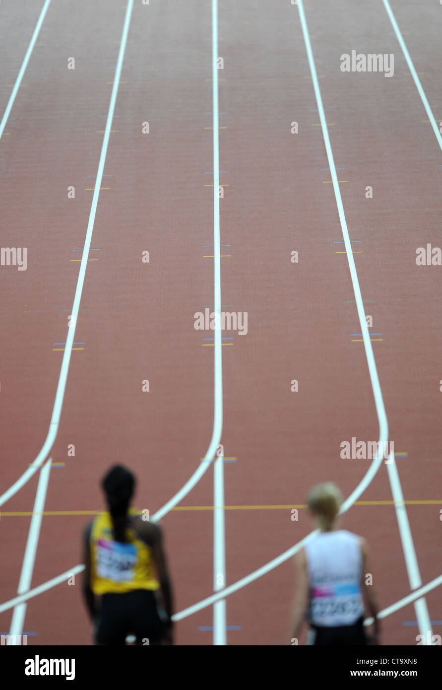 Athletes competing on a running track Stock Photo - Alamy