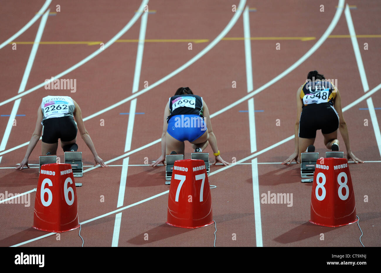 Athletes competing on a running track Stock Photo - Alamy