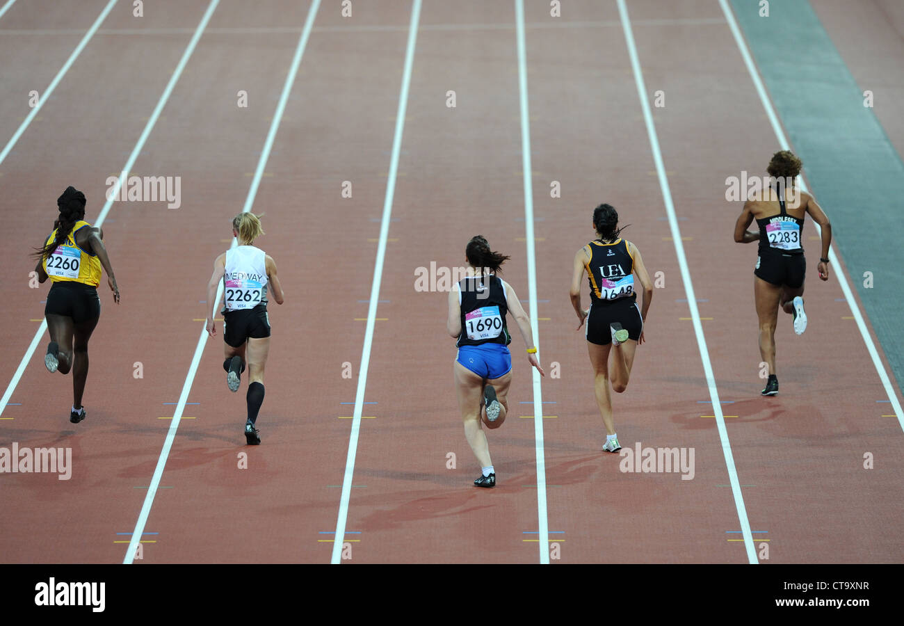 Athletes competing on a running track Stock Photo - Alamy