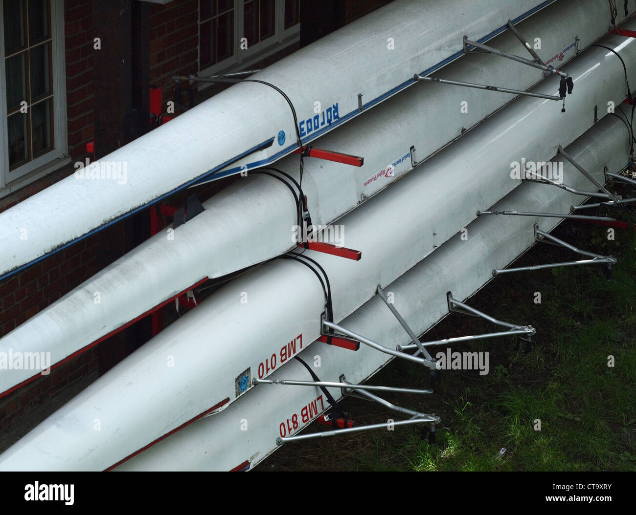 rowing boats stacked Stock Photo - Alamy
