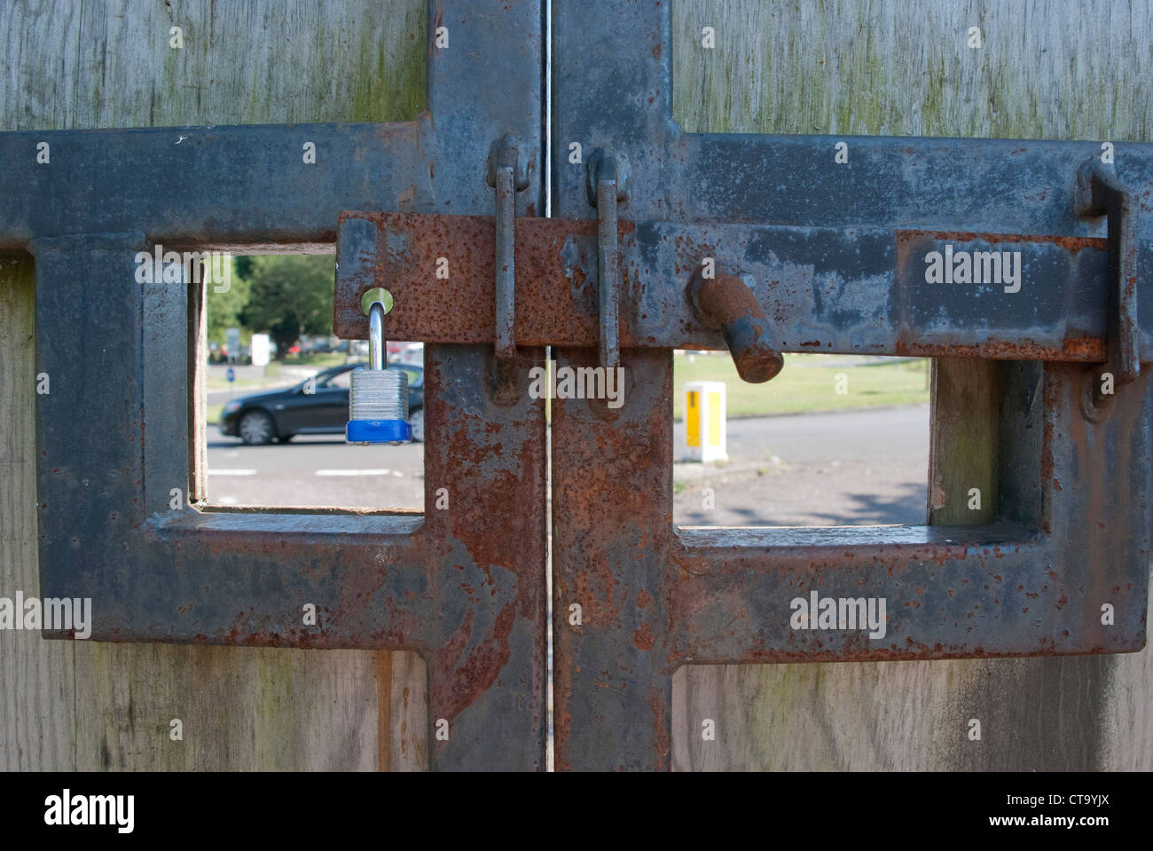 Looking out from inside a set of gates securing the redevelopment site ...