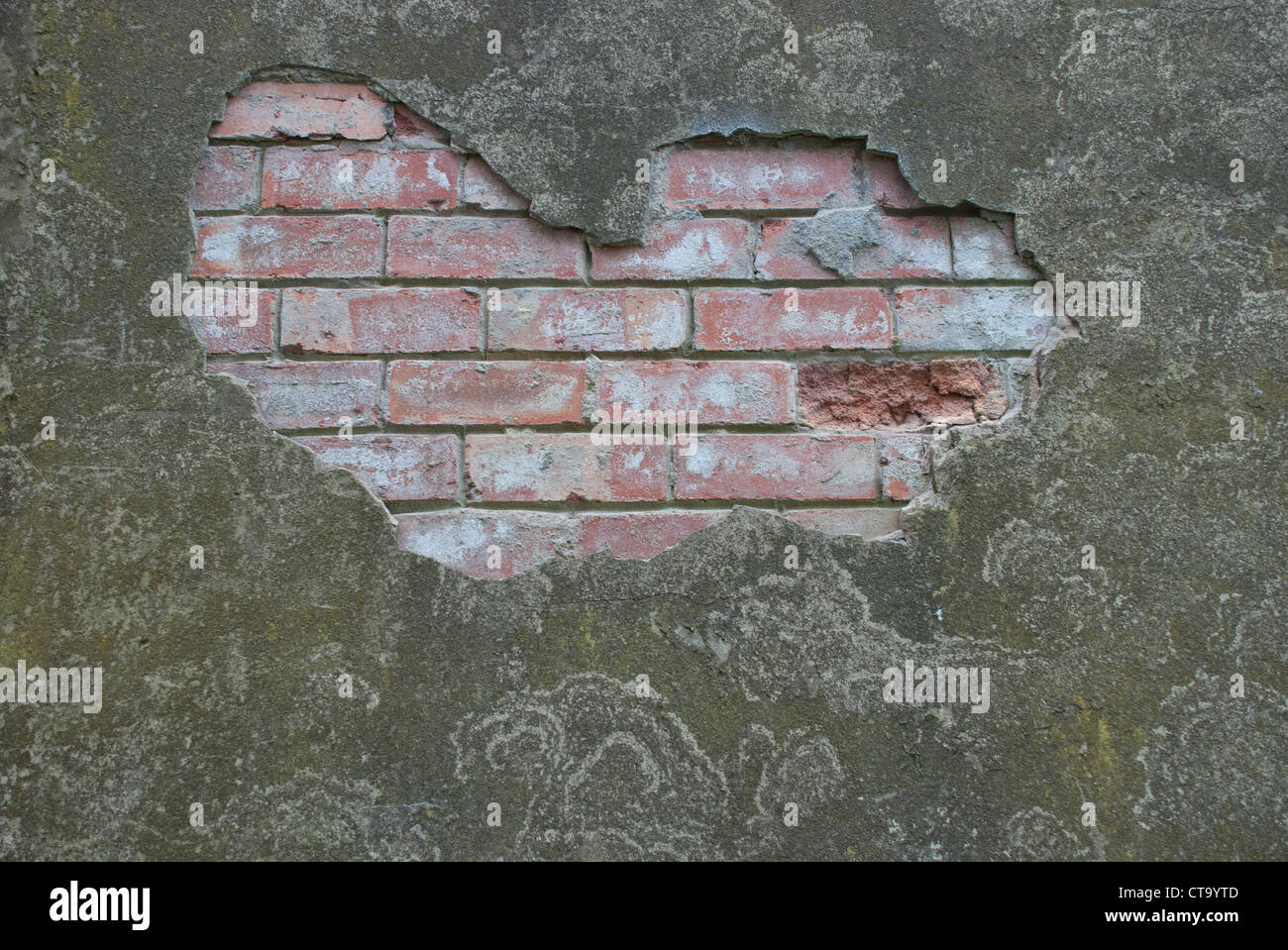 Crumbling plaster on a brick wall Stock Photo - Alamy