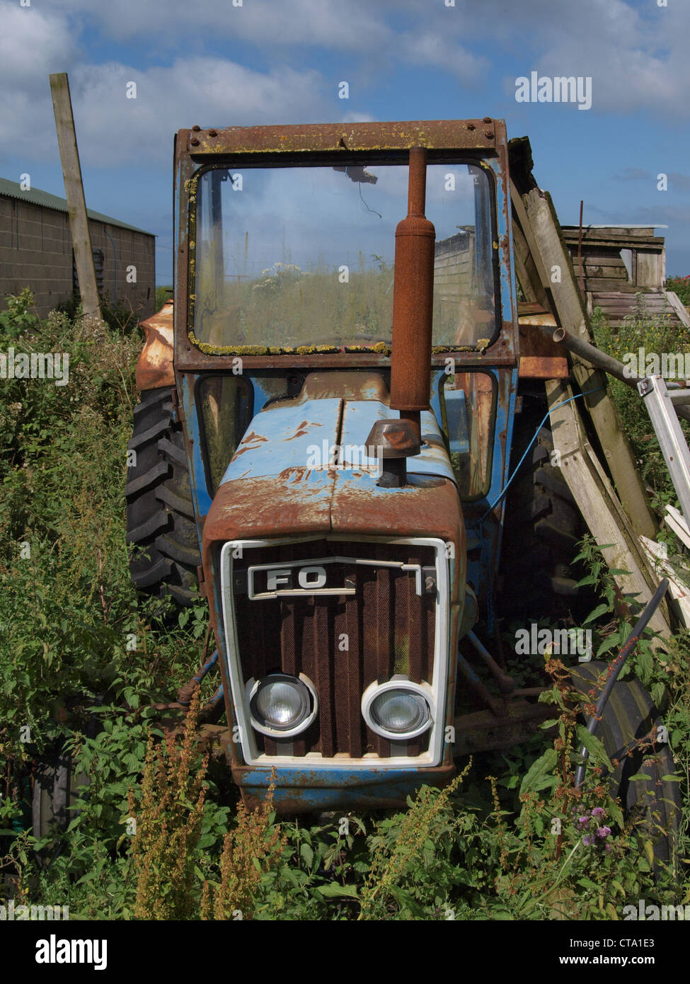 Old rusting Ford Tractor. Dorset. UK Stock Photo - Alamy