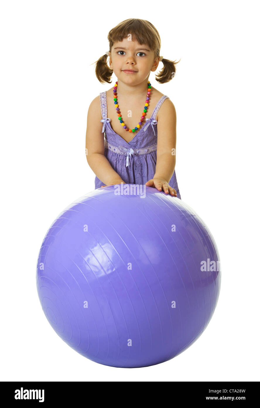 Little girl with a large rubber ball isolated on white background Stock ...
