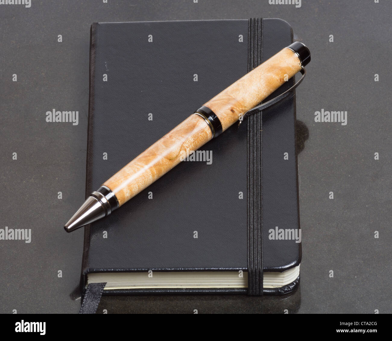 Notebook or diary and pen Stock Photo - Alamy