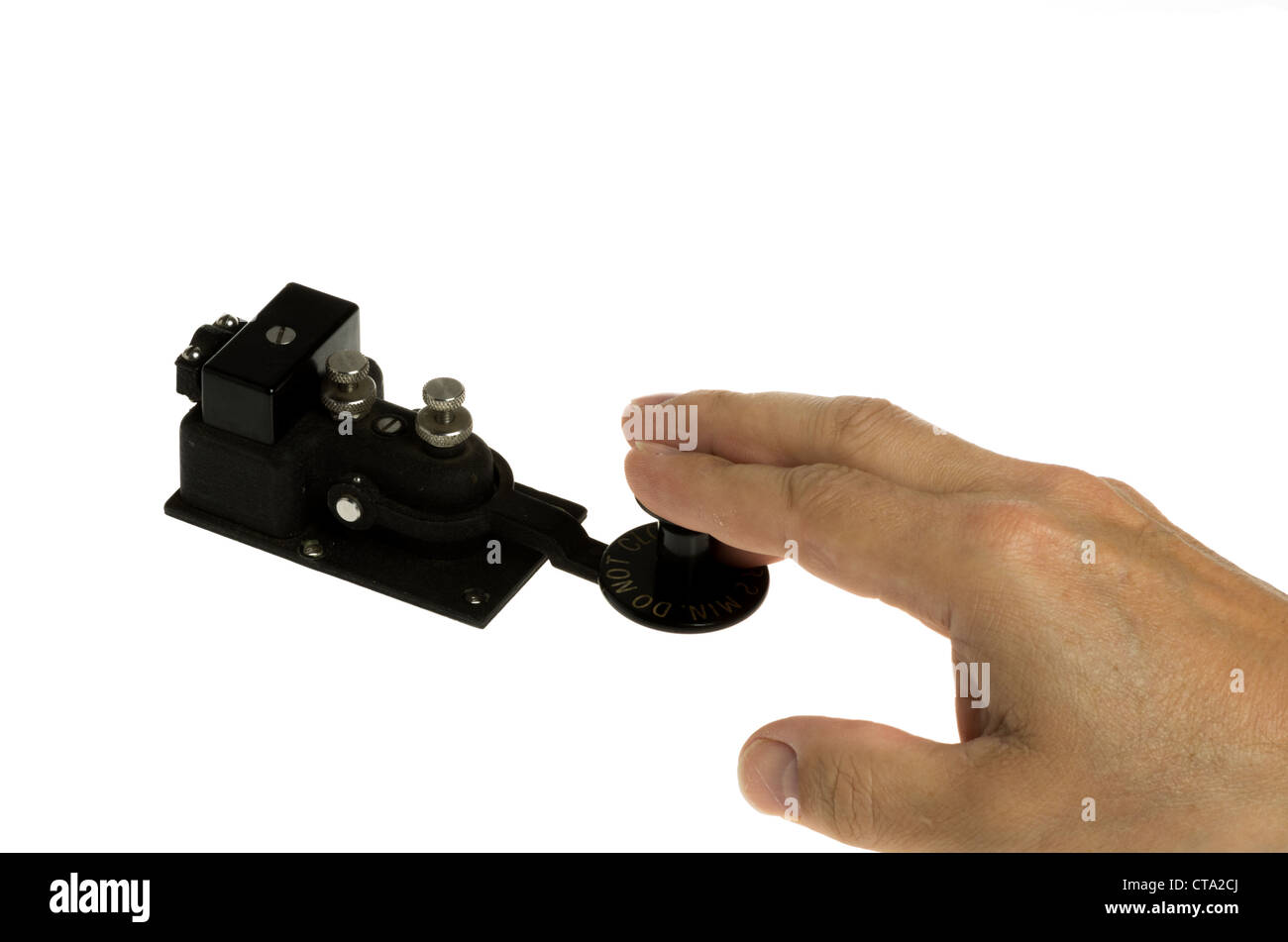 A telegraph key being operated isolated on white Stock Photo - Alamy