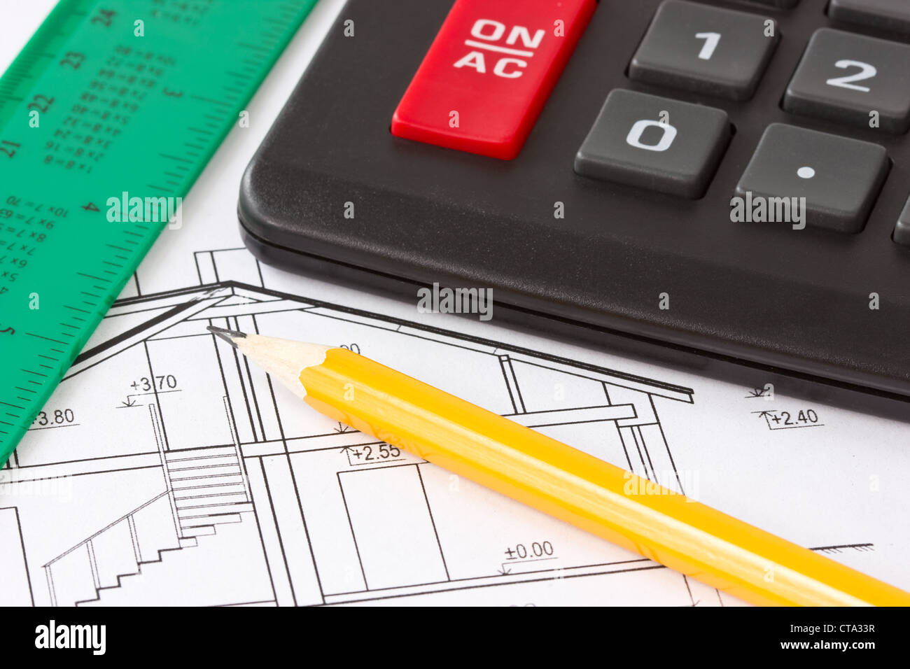 Part of architectural construction plan with pencil,calculator and ...