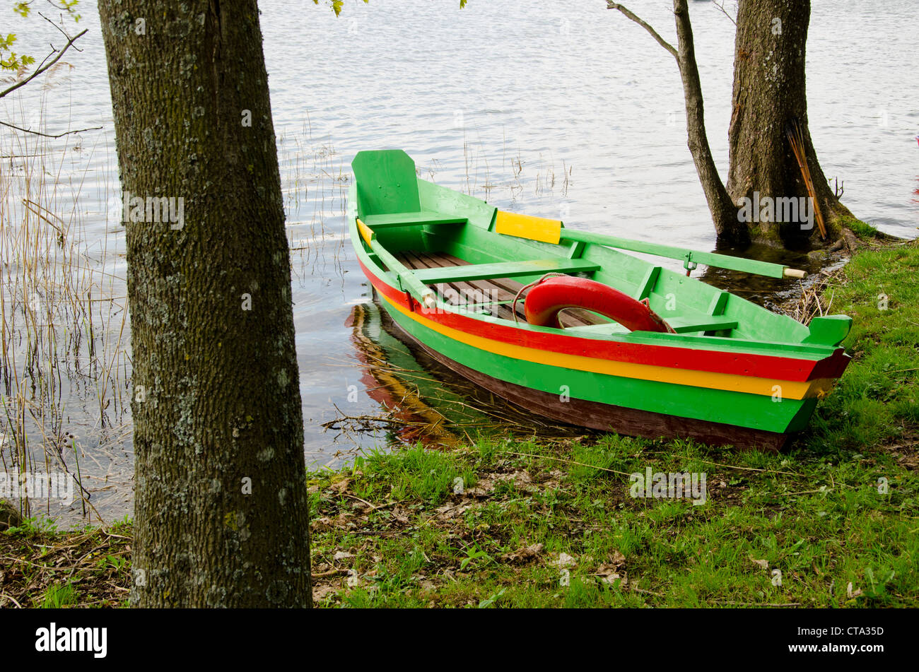 colorful boat on the summer resort lake coast Stock Photo - Alamy
