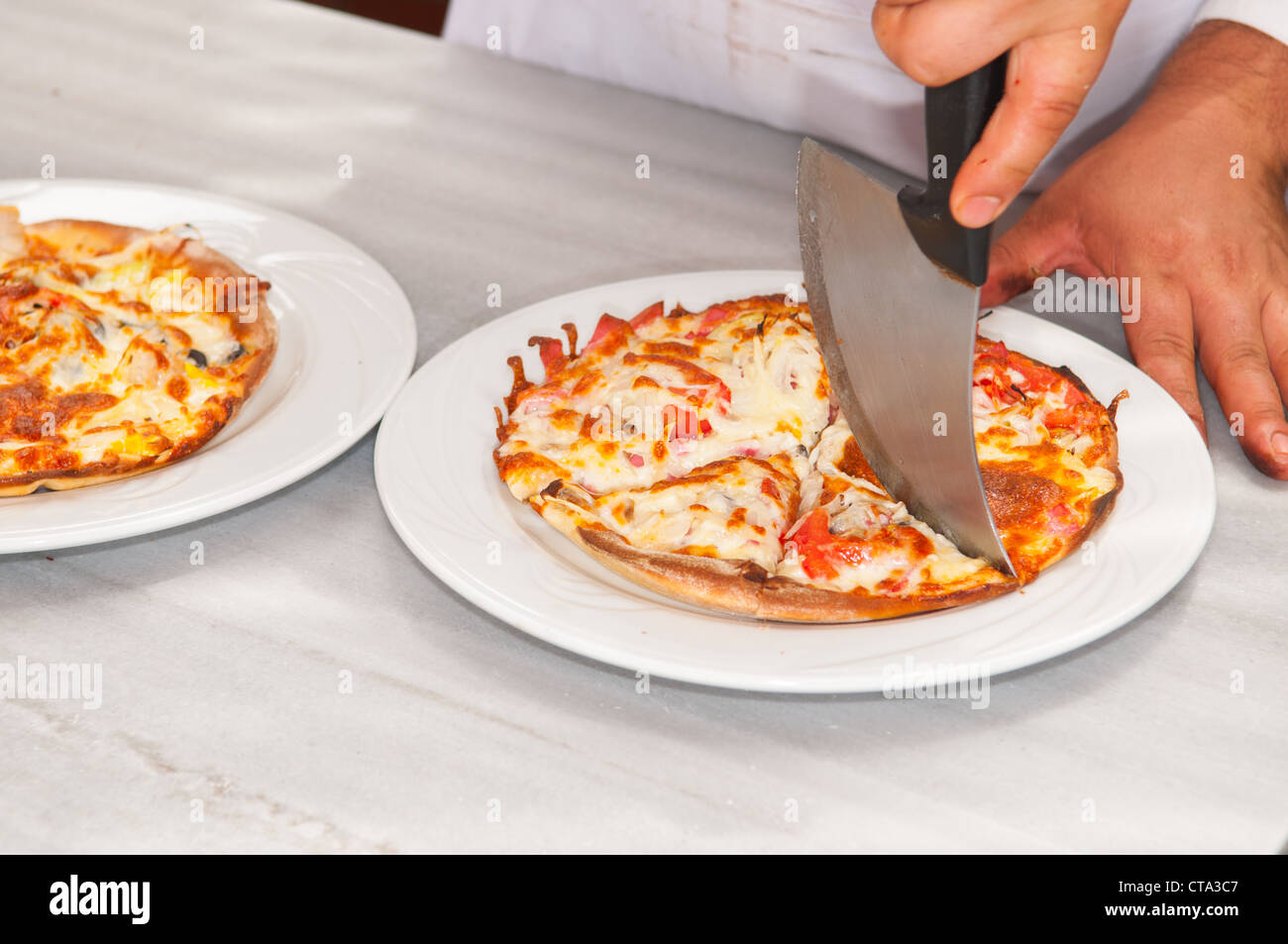 Closeup hand of chef baker making pizza Stock Photo - Alamy