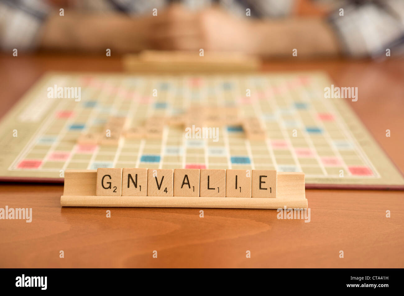 man playing scrabble Stock Photo - Alamy