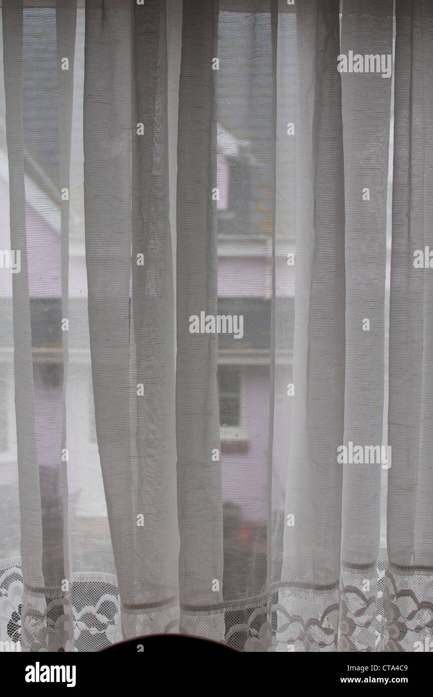 Net curtains hi-res stock photography and images - Alamy