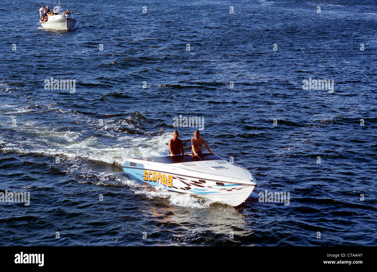 Boat pulls into harbor hi-res stock photography and images - Alamy