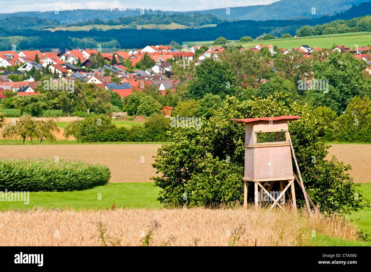 hunting stand with village Stock Photo - Alamy