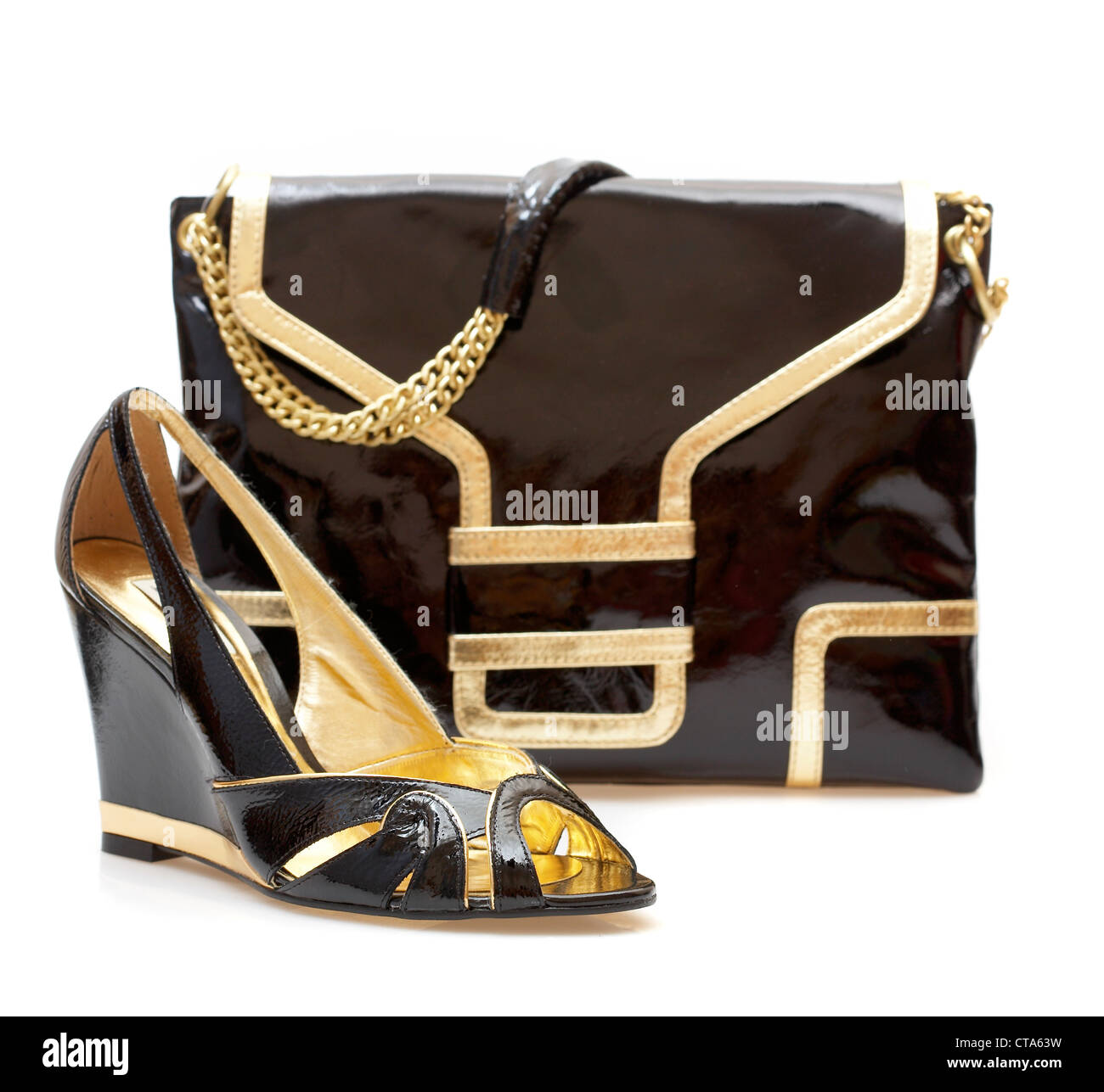 Female shoes and handbag on it is white a background Stock Photo - Alamy