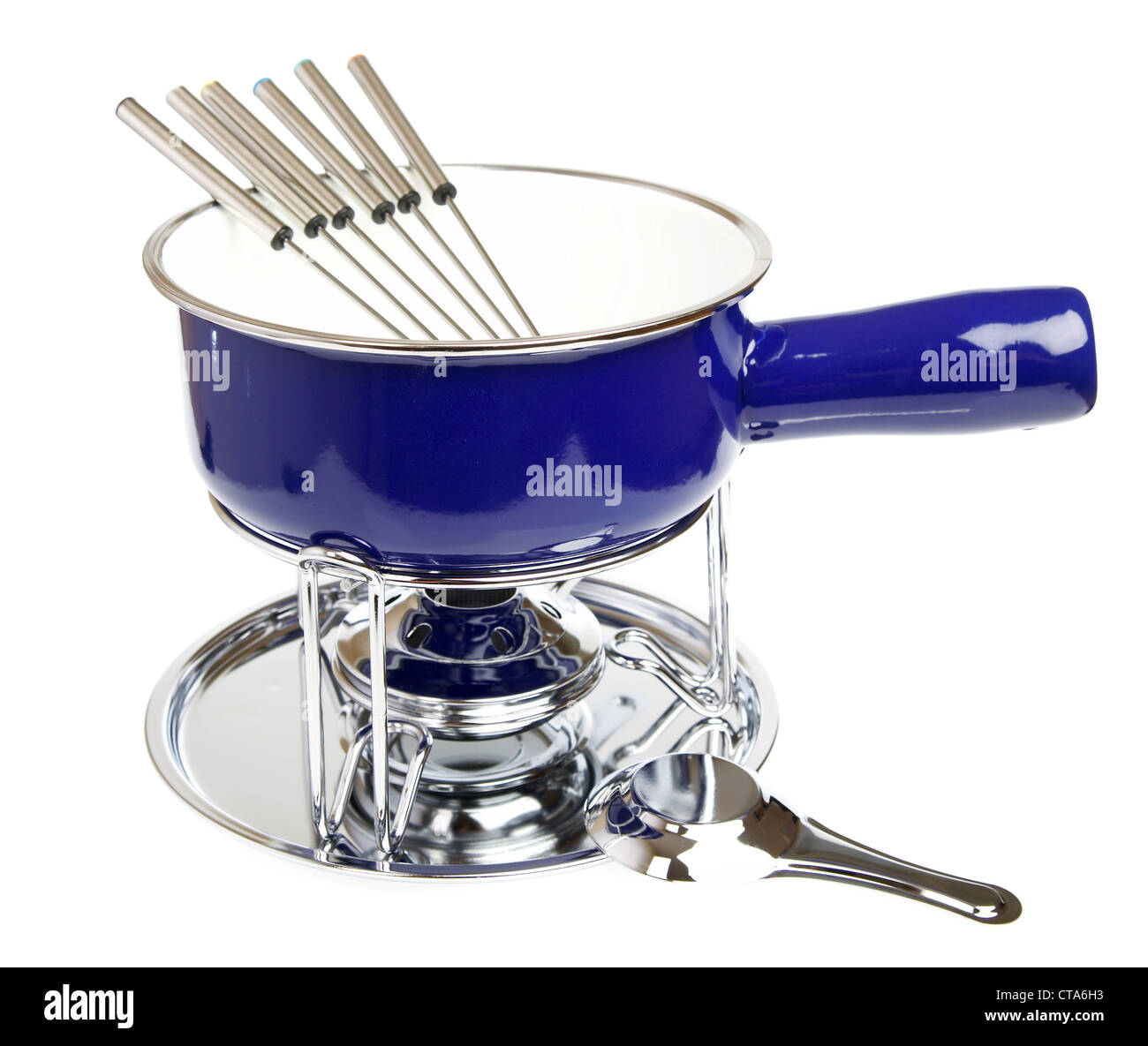 Fondue set isolated on a white background Stock Photo - Alamy
