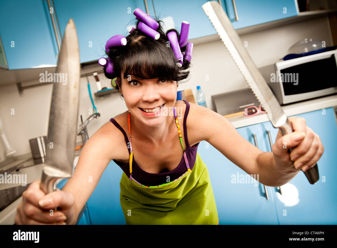 crazy housewife in an interior of the kitchen Stock Photo - Alamy