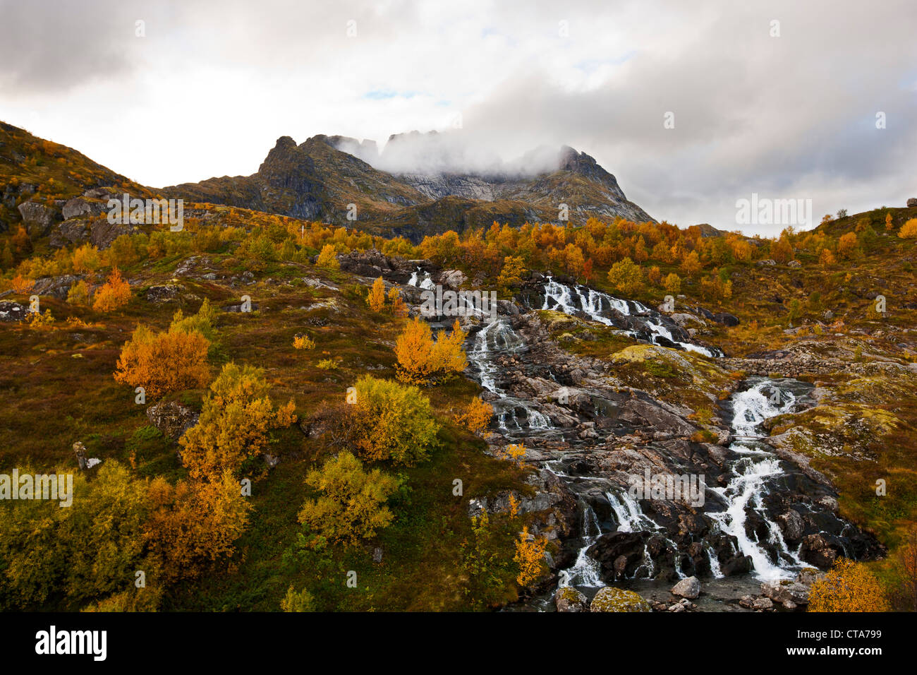 Stream running down a mountain, landscape on the Lofoten at A, Autumn ...