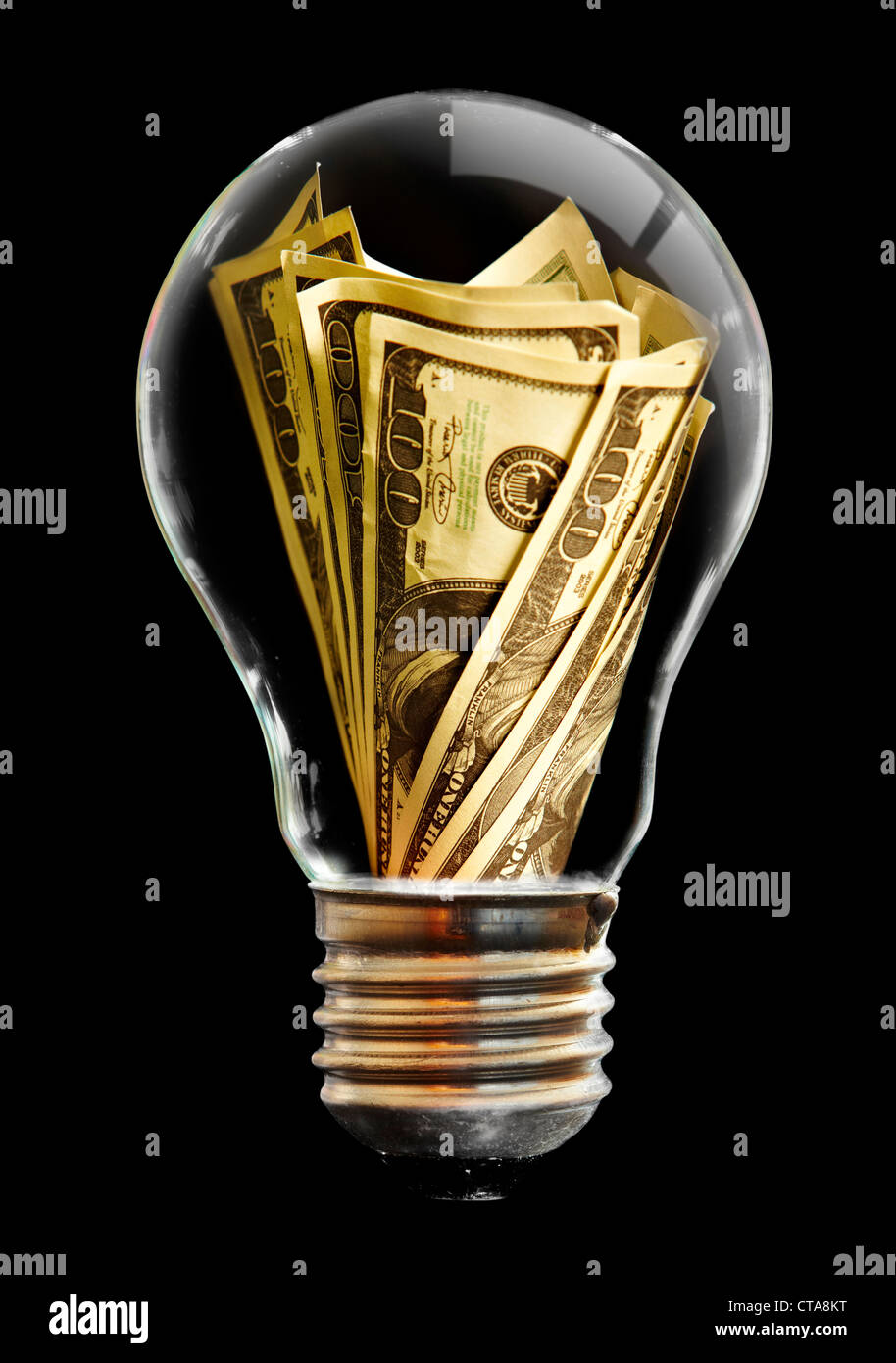 The light bulb and dollar Stock Photo - Alamy