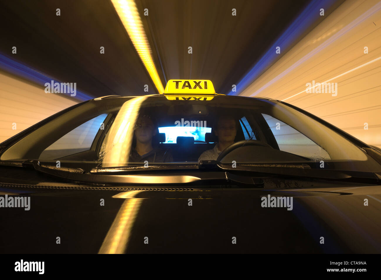 Taxi entering a tunnel, seen from the hood of the car Stock Photo - Alamy