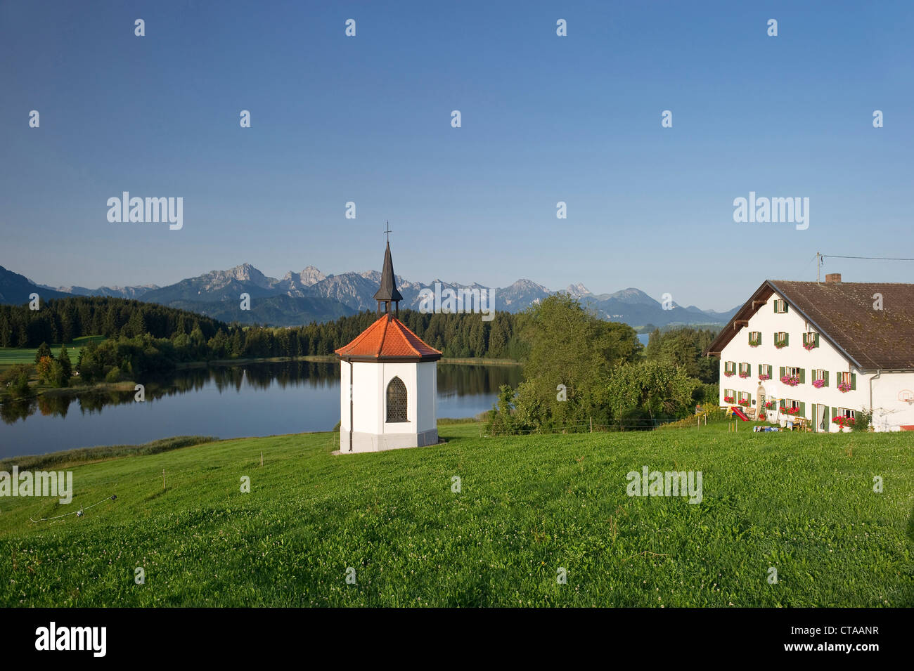 Chapel Royal at lake Hegratsried, Halblech, Allgaeu, Bavaria, Germany ...
