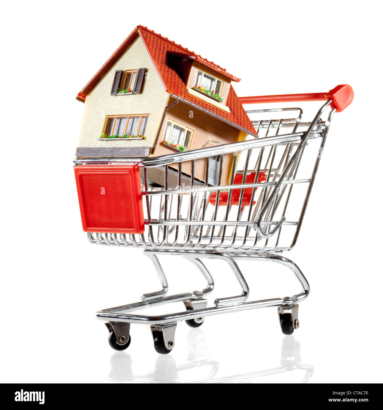 House in shopping cart on a white background Stock Photo - Alamy