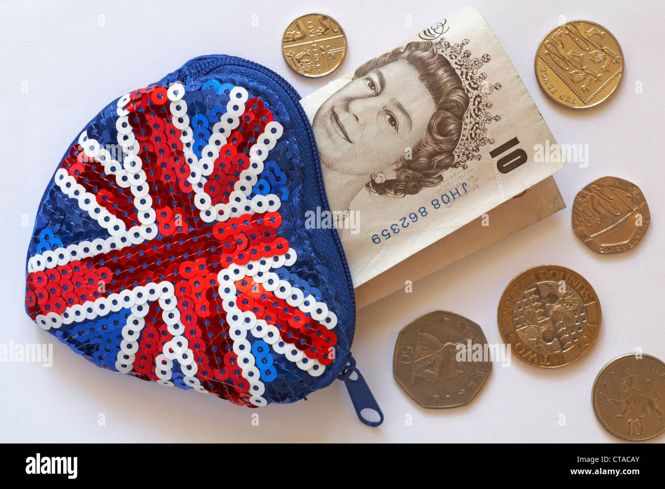 British coins and £10 note with red, white and blue sequined Union Jack ...